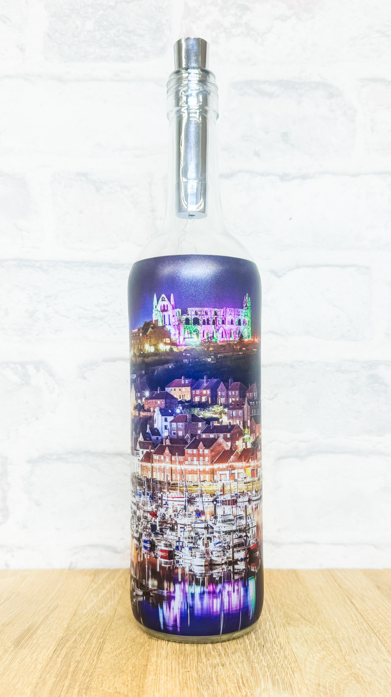 Illuminated Abbey Green And Purple Reflections Over The Whitby River ...